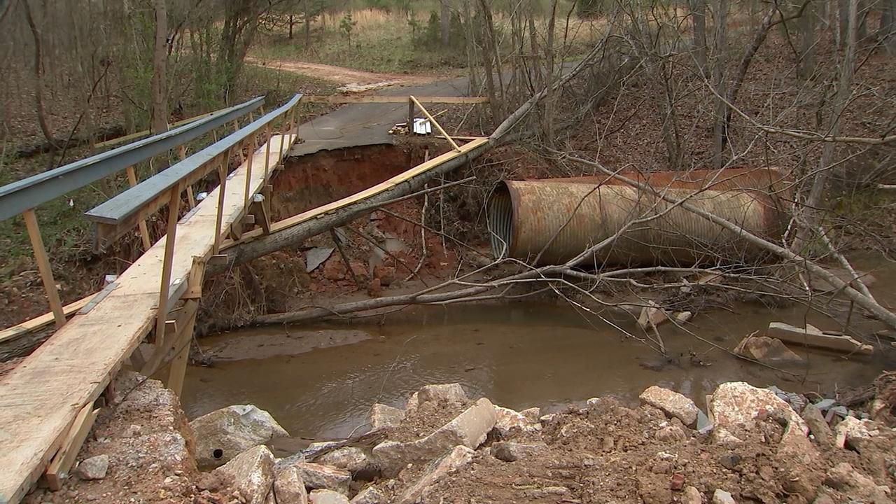 Homeowners build bridge over driveway washed out by flood – WSOC TV
