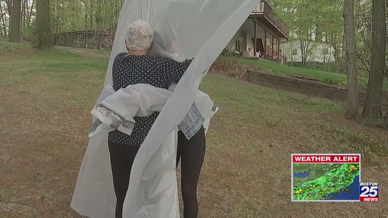 Millbury family creates ‘hug curtain’ to embrace grandparents in quarantine