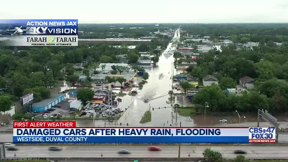 WATCH: Heavy rain and flooding leave some drivers stuck for hours ...