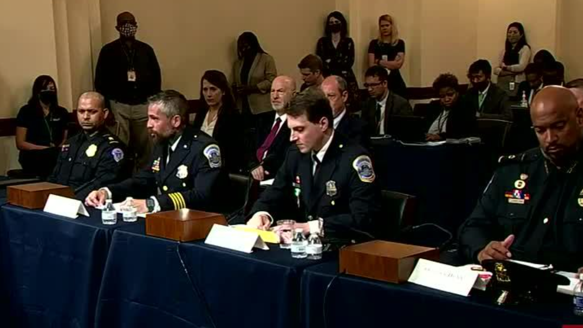 Officers describe being beaten, chants for their execution during ...