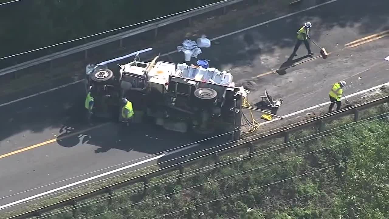 Truck carrying 'hazardous materials' overturns on Georgia highway