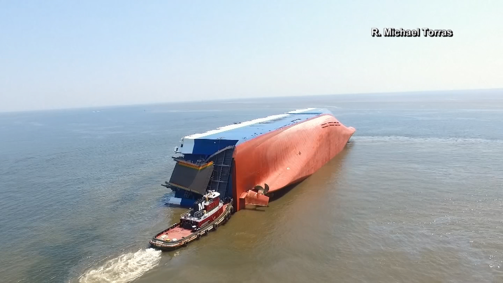 All crew members rescued from overturned cargo ship
