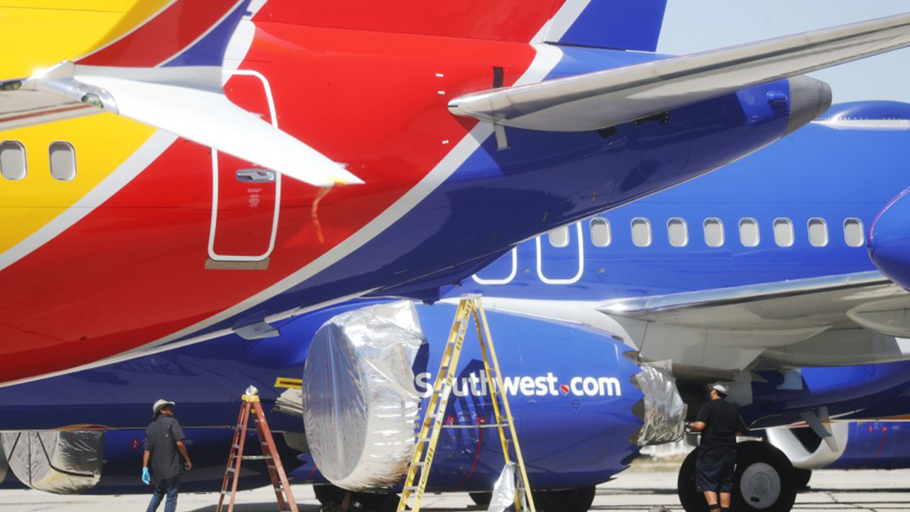 Southwest plane blown into jet bridge at Logan airport