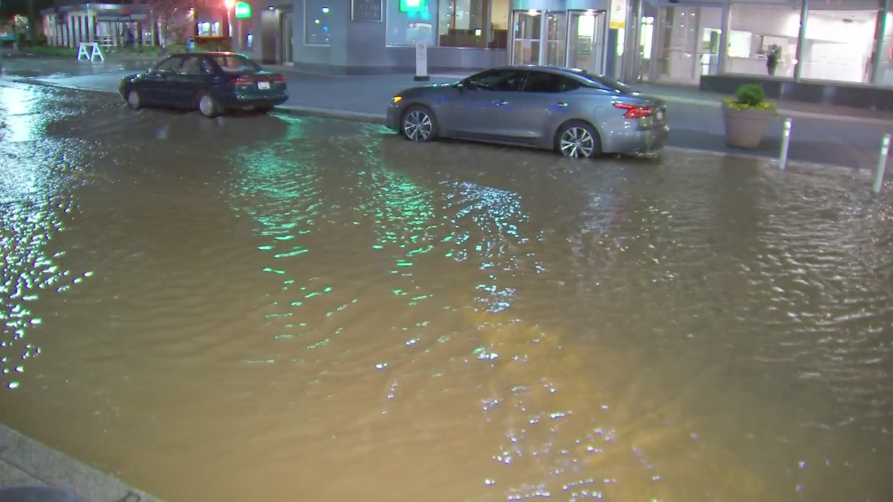 Water main break rips apart sidewalk, floods street in downtown ...