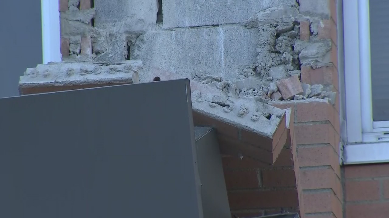 Street blocked off as crews pull down crumbling columns – WPXI
