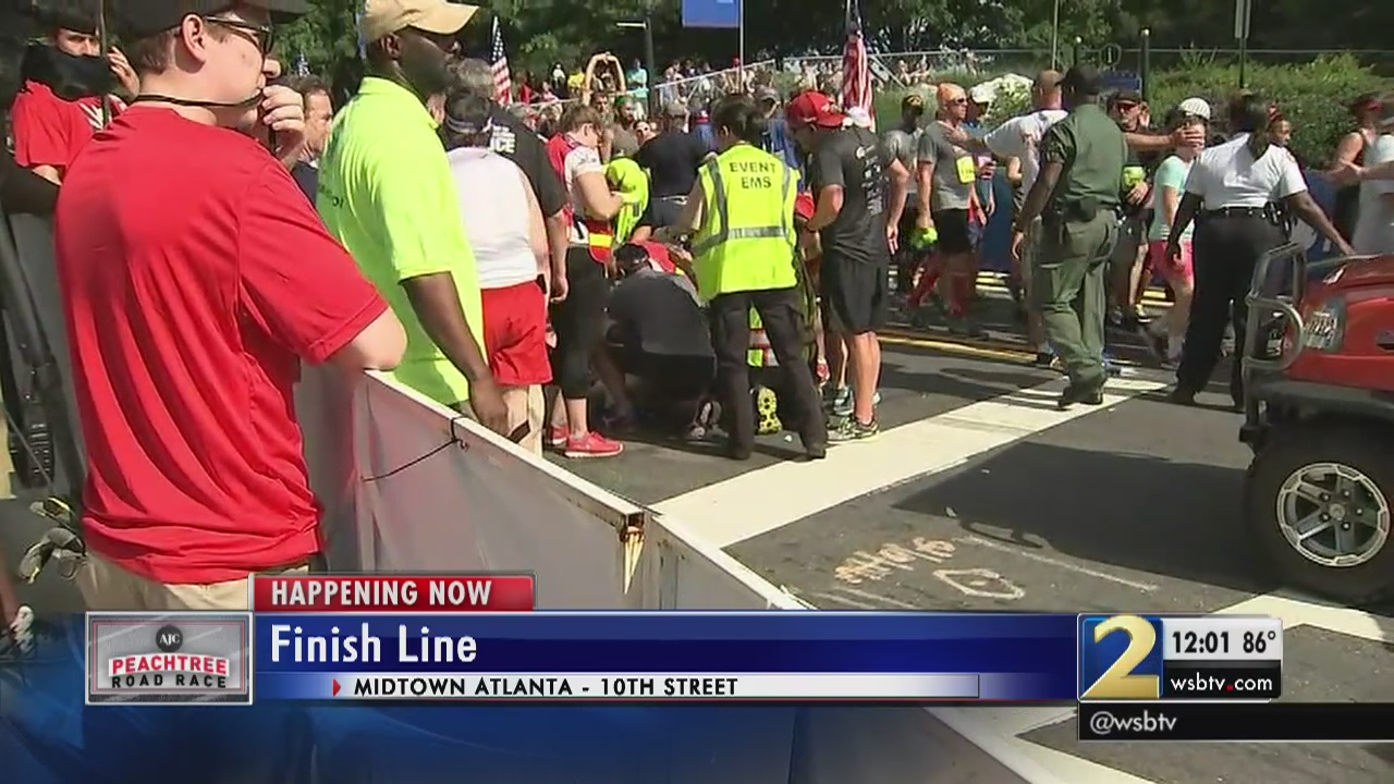Runner collapses at finish line of AJC Peachtree Road Race