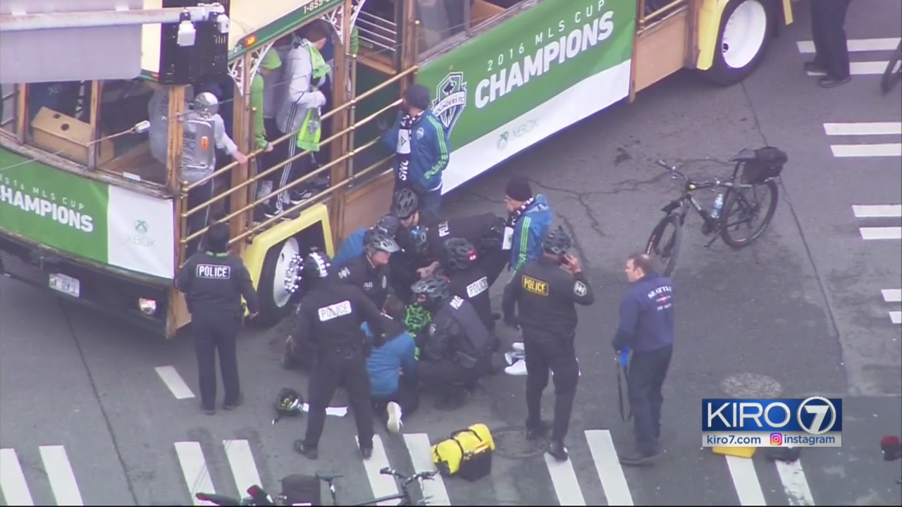 Seattle PD bike officer injured in crash with trolley during Sounders ...
